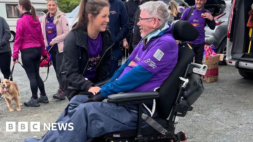 Rob Burrow's wife Lindsey joins MND fundraiser's mountain trek - BBC News