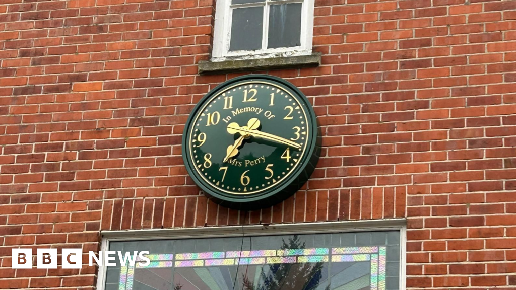 Ruth Perry: Playground clock mounted as tribute to head - BBC News