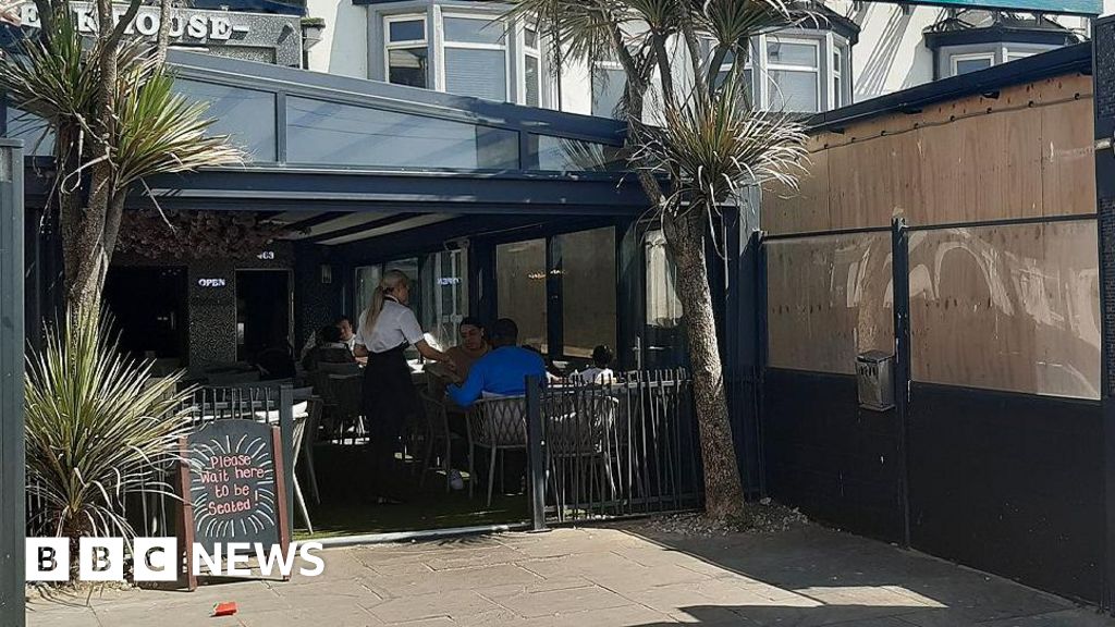 Promenade restaurant resumes battle to keep Covid atrium - BBC News