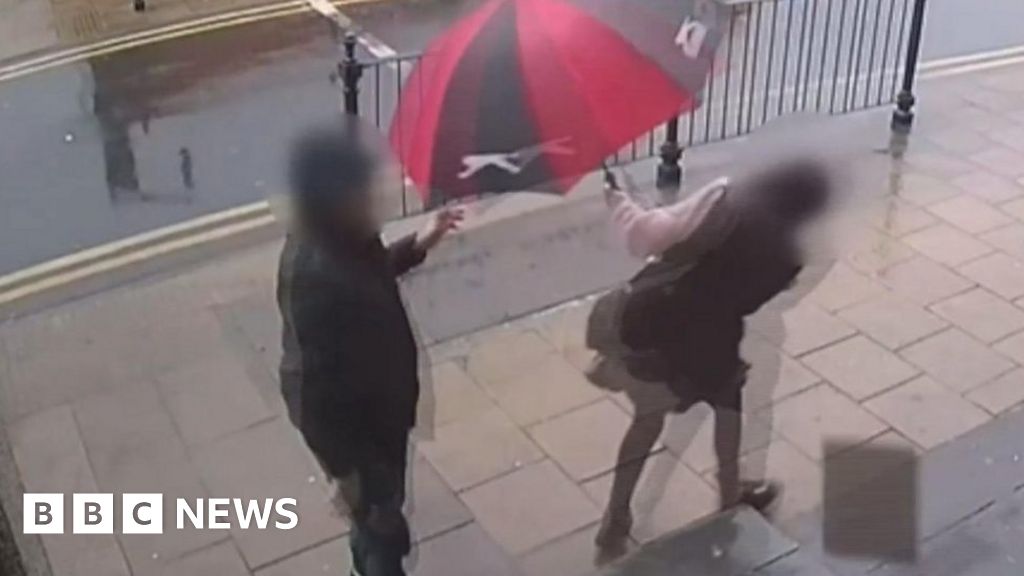Arrest over video of man throwing paving slab at woman
