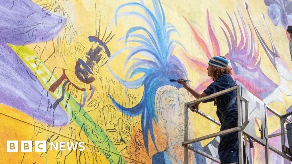 Leeds: Giant mural celebrates West Indian Carnival - BBC News