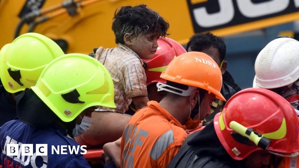India building collapse: 13 dead as search for survivors continues ...