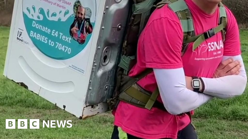 Man to run Gloucester half marathon carrying washing machine - BBC News