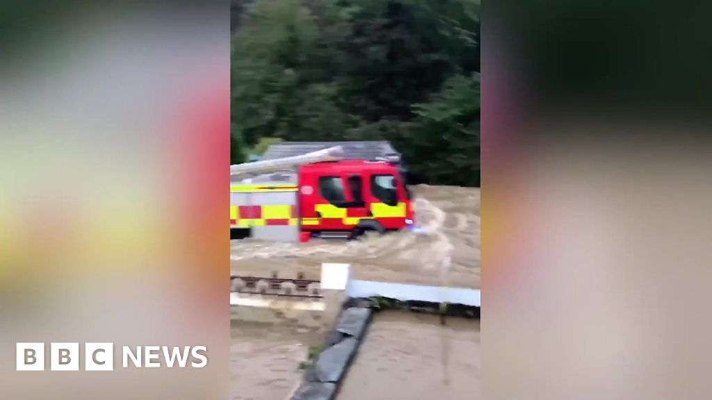 Isle of Man: Fire engine swept away by flood water