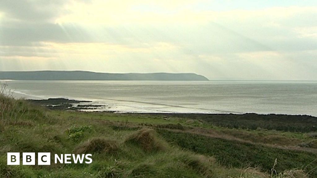 Barricane Beach: Two people rescued off north Devon coast - BBC News