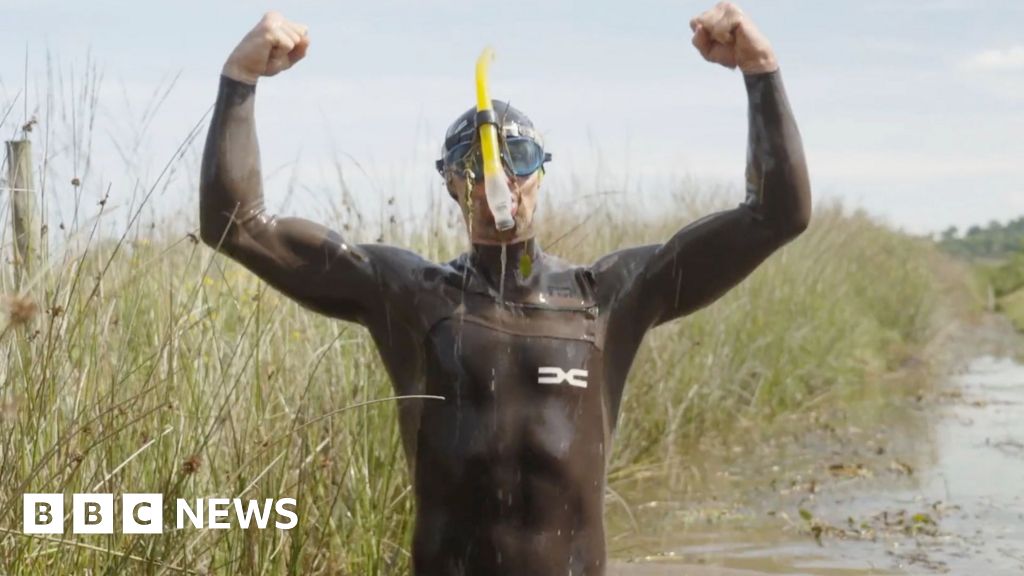 World's first professional bog snorkeler - BBC News