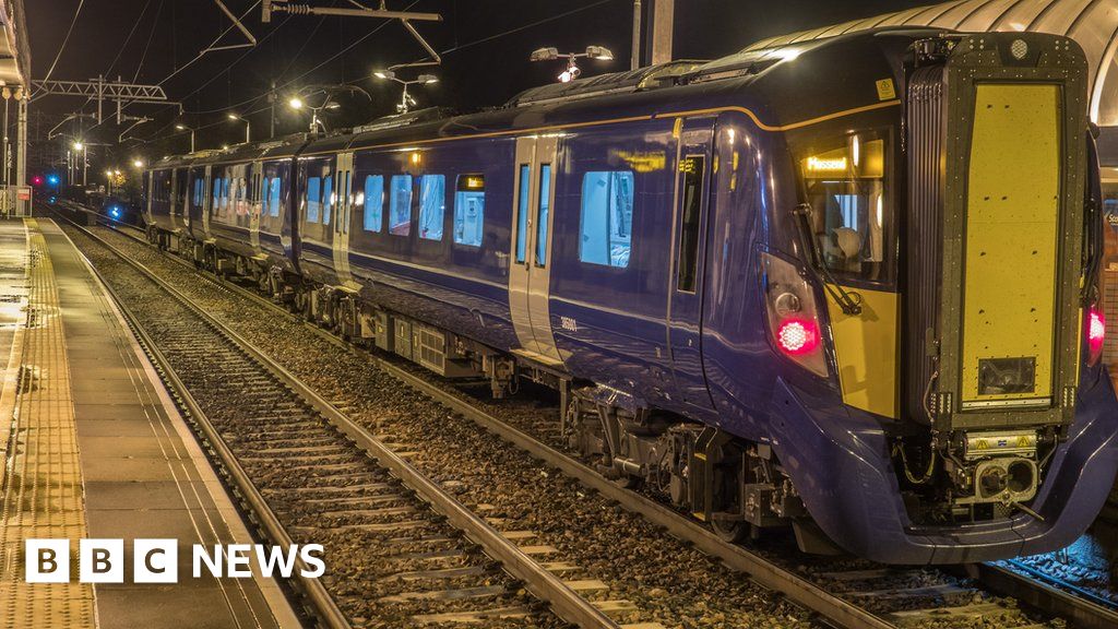 ScotRail electric train makes first short trip - BBC News