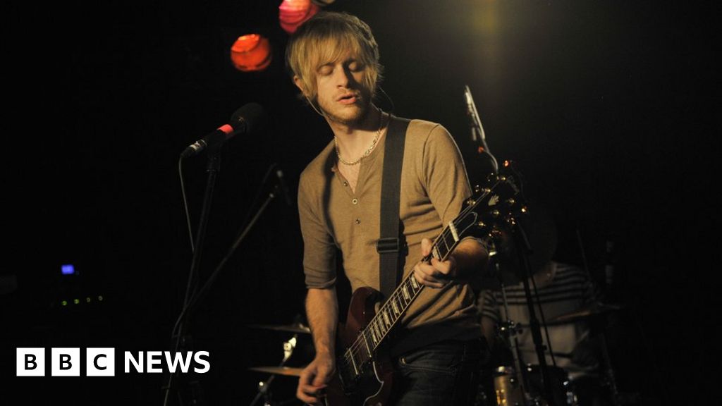 Greg Gilbert's niece takes on swimming challenge in his memory - BBC News