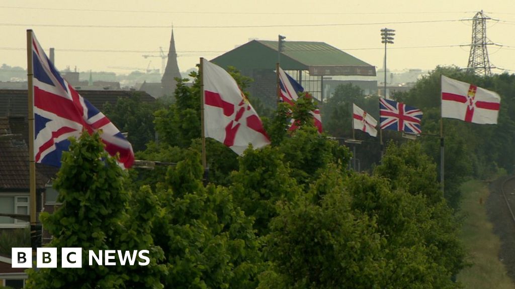 Stormont votes for release of completed flags and culture report - BBC News