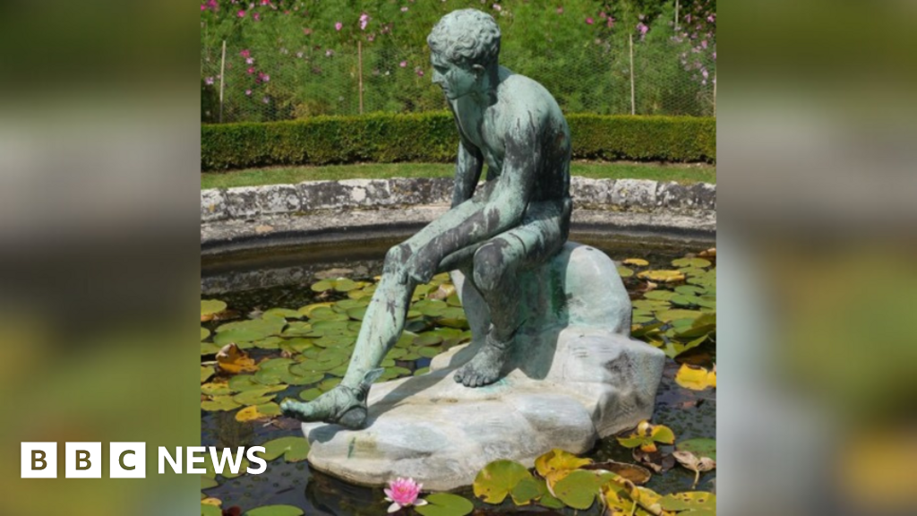 Bronze statue of Greek god Hermes taken from Northampton estate - BBC News