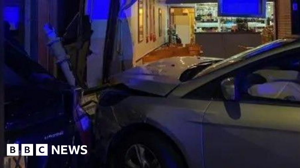 Kent: Arrest after car involved in crash hits restaurant window