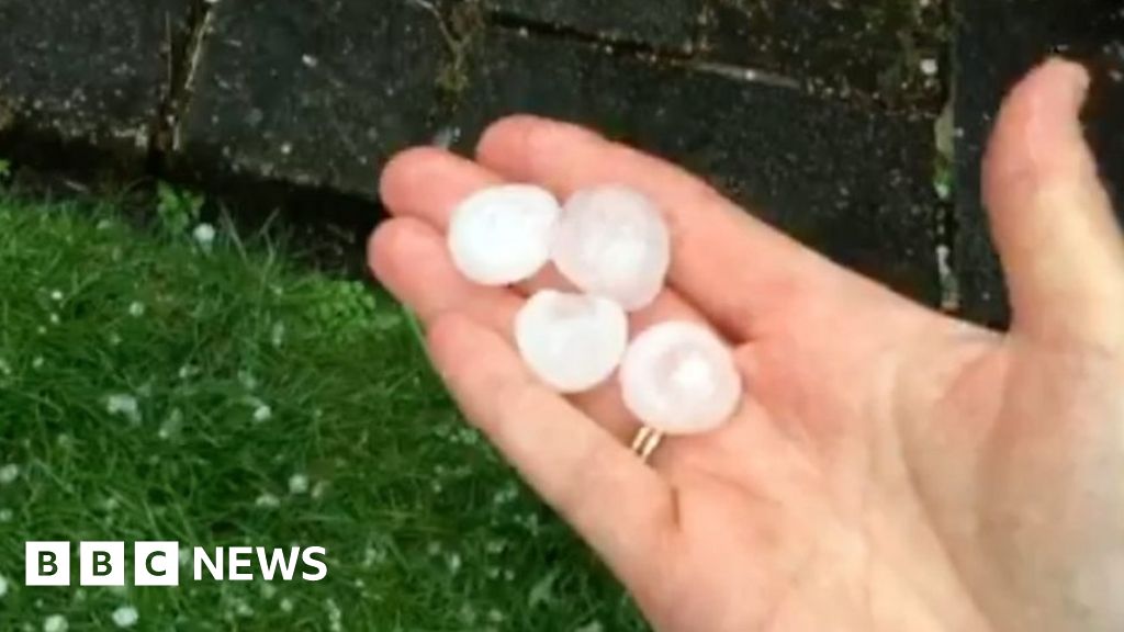 Hailstones as big as 20p pieces fall on hottest July day - BBC News