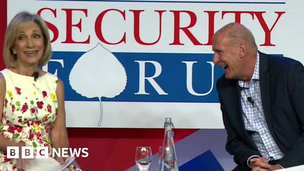 Spy chief reacts to Putin visit: 'That's going to be special' - BBC News