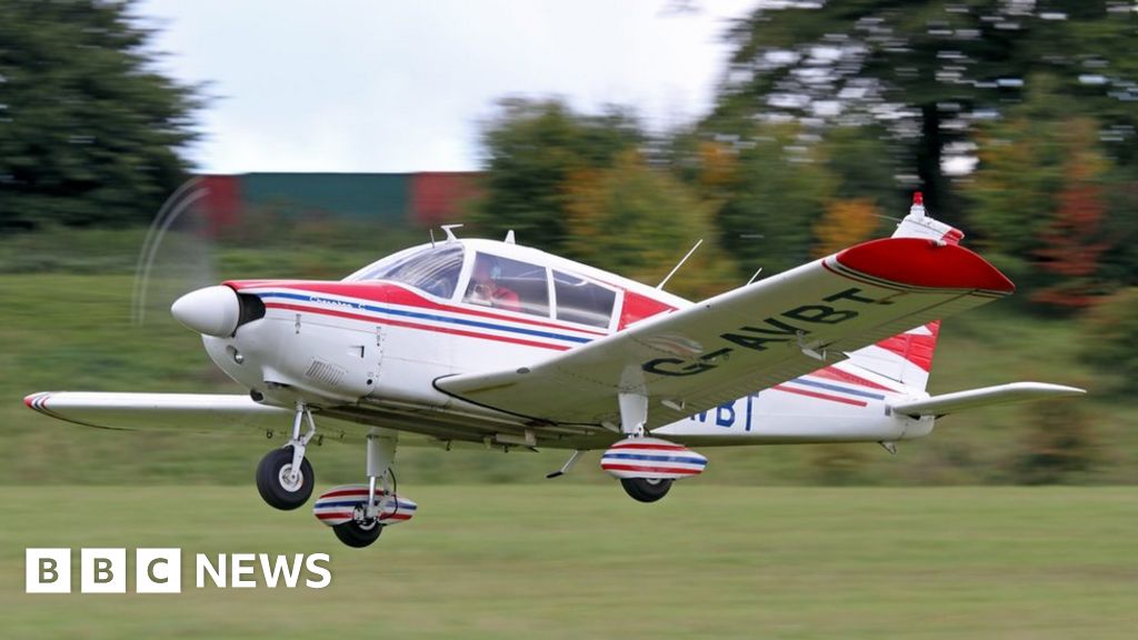 Powys: Learner pilot crash lands after plane door opens - BBC News