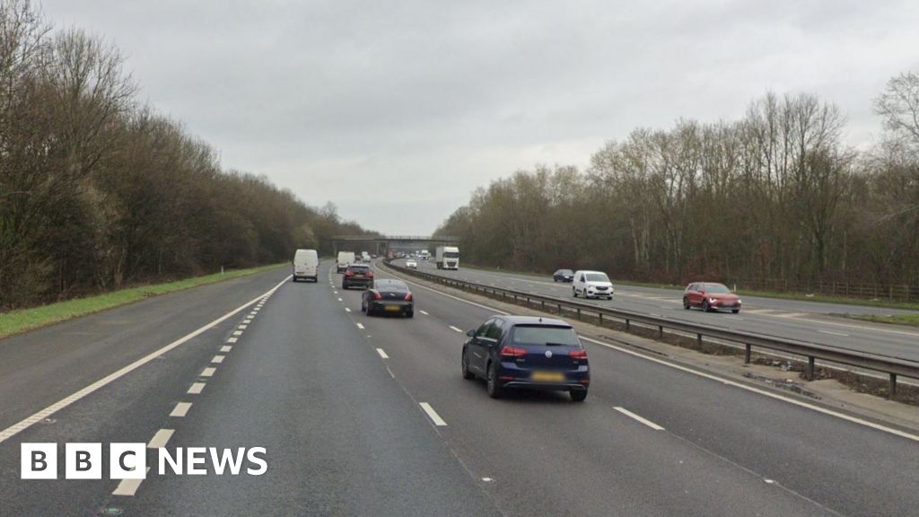 Man struck by lorry on M57 dies - BBC News