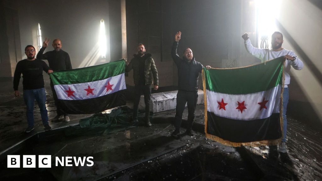 Syria rebels burn tomb of Bashar al-Assad's father
