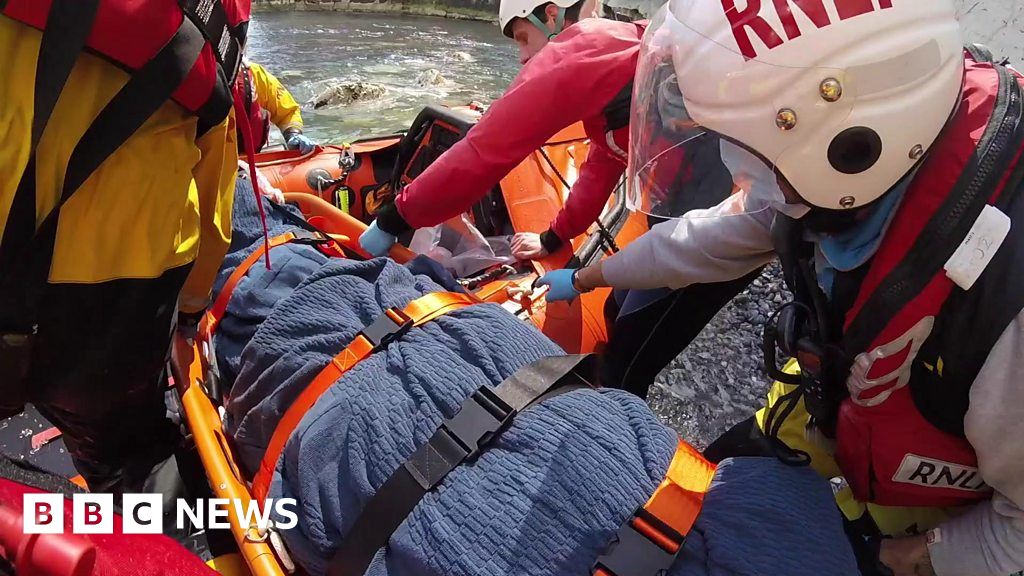Man who survived Dorset cliff fall leaves hospital