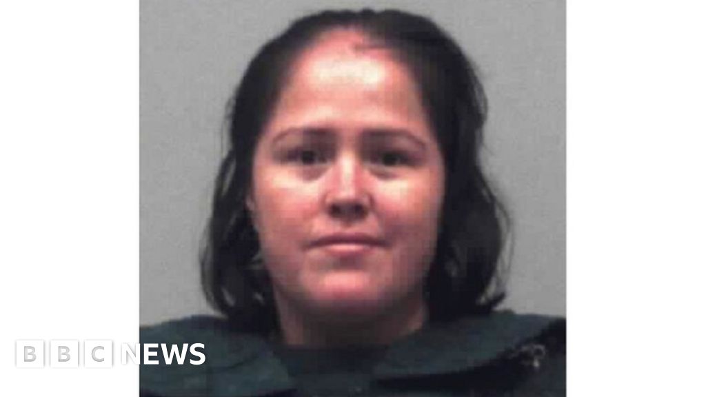 Georgia mother held as father and four children stabbed to death