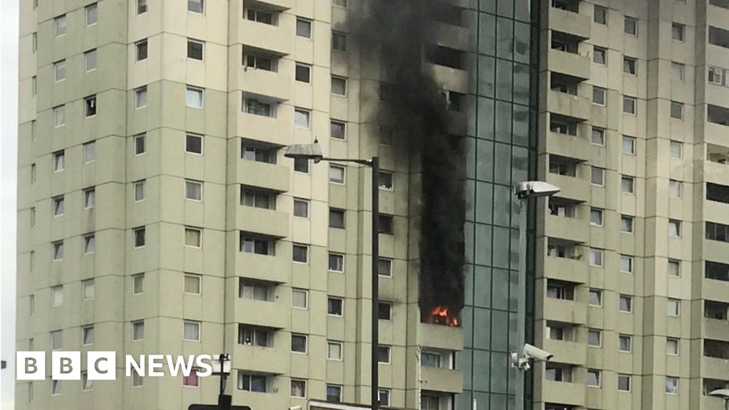 Edmonton tower block fire: 50 firefighters extinguish blaze - BBC News