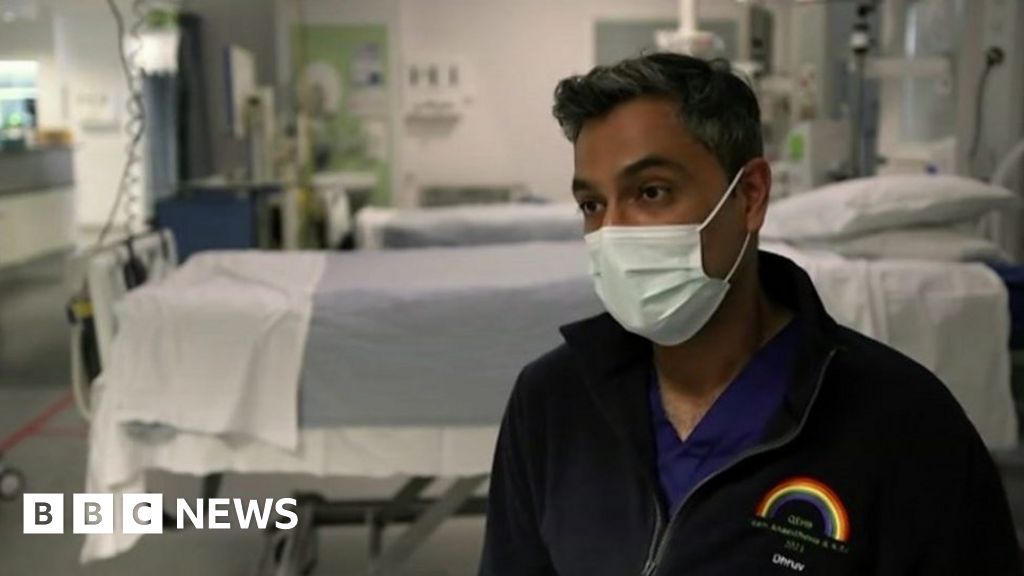 Pressure on QE Hospital Birmingham staff 'immense' - BBC News