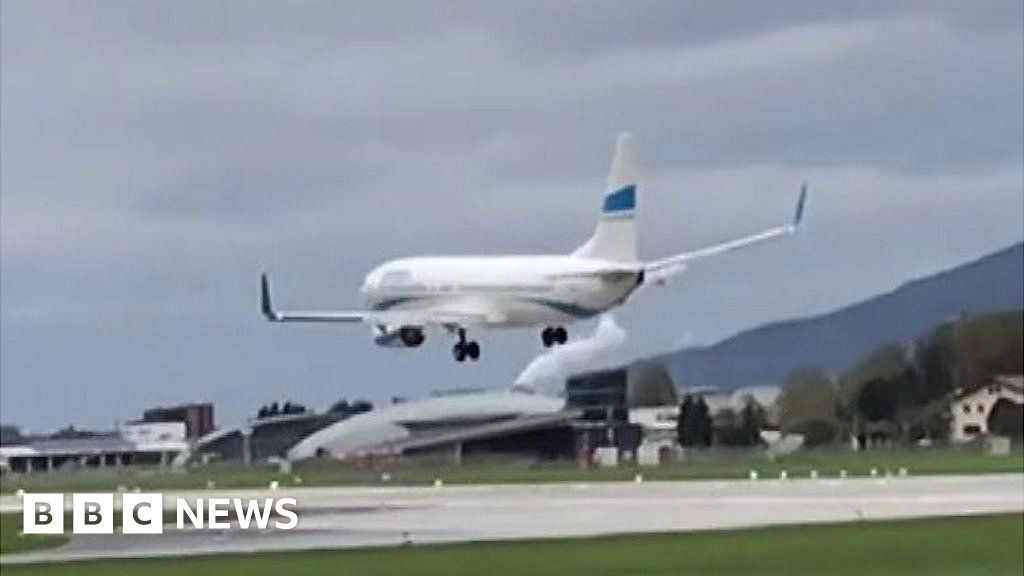 Plane tries to land in Austria storm... takes off again - BBC News