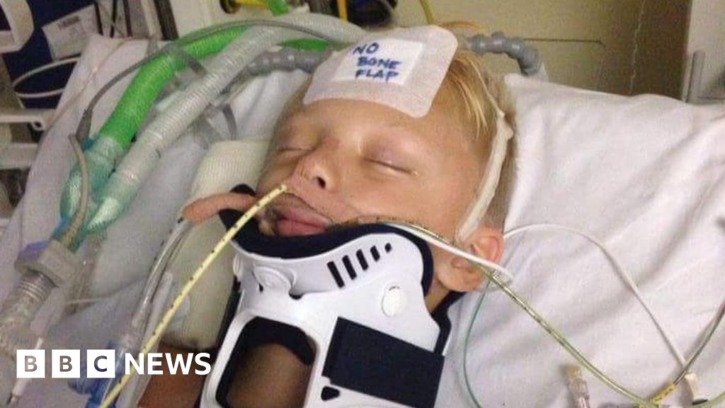 Car crash boy back at school after 'amazing' recovery - BBC News