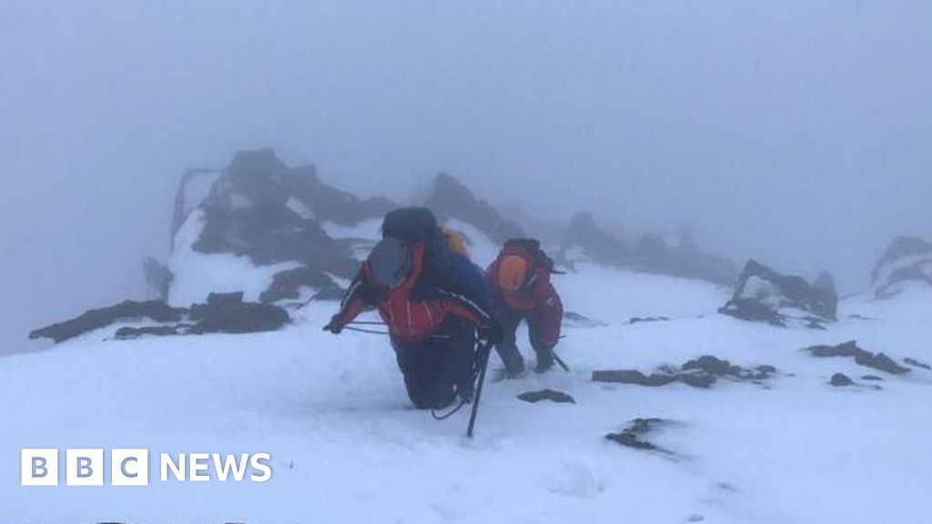 Two rescued on Snowdon after being stuck in snow and ice - BBC News