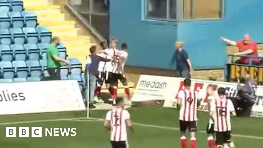 Gillingham FC: Football fan admits assault over player shove - BBC News