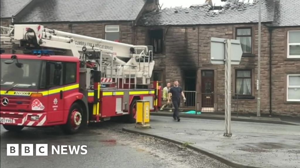 Distington house fire: Man and teenage girl killed - BBC News