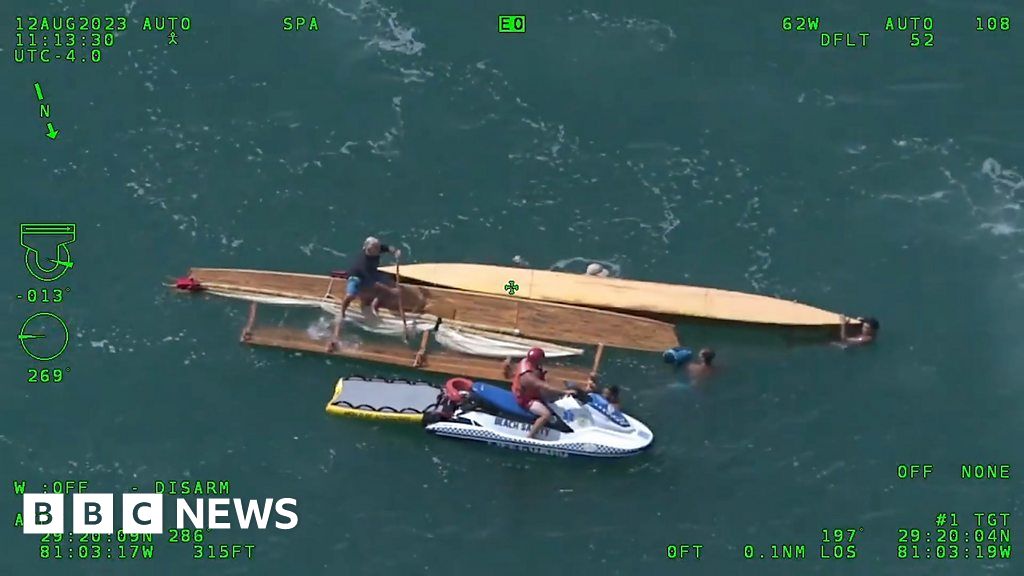 Watch the moment 11 people are rescued after their boat split in two