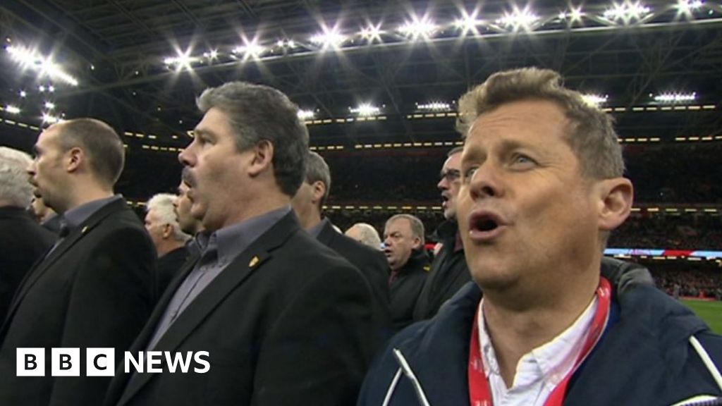 Mike Bushell learns power of song at Wales rugby match