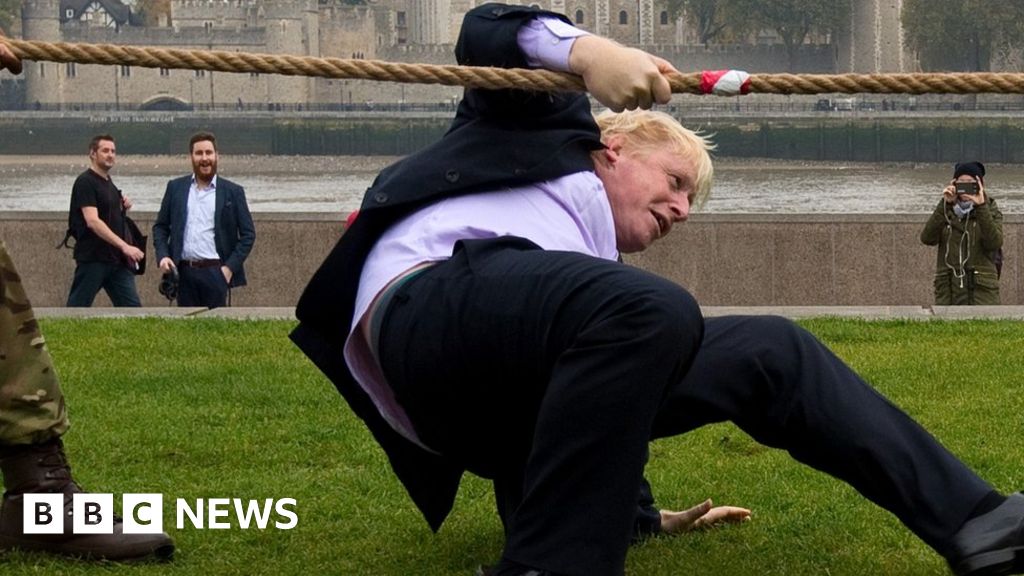 Boris Johnson takes a tumble in tug of war with armed forces - BBC News