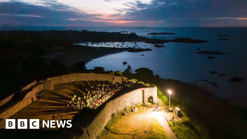 Hundreds in Guernsey join sunrise suicide awareness walk - BBC News
