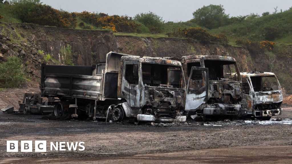 West Belfast: Fire that destroyed lorries deliberate, PSNI says