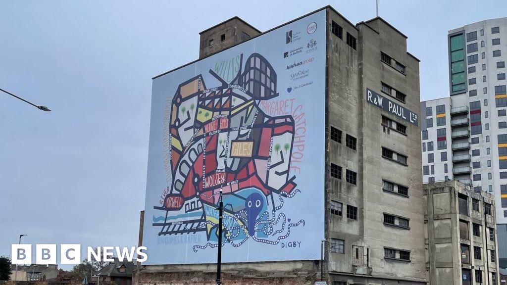 Ipswich waterfront new banner featuring octopus mascot unveiled - BBC News