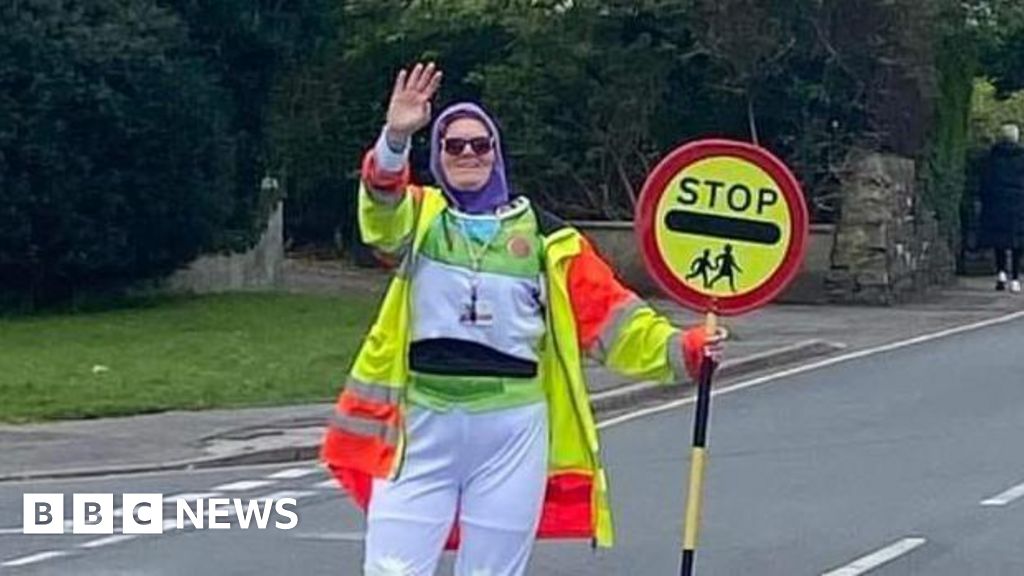 Ulverston lollipop lady dons fancy dress for St Mary's hospice - BBC News