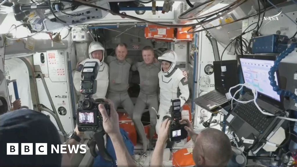 Watch: Moment Nasa astronauts begin journey back to Earth - BBC News