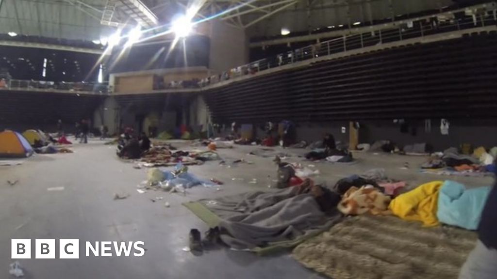 Migrant crisis: Inside a former Olympic stadium housing refugees - BBC News