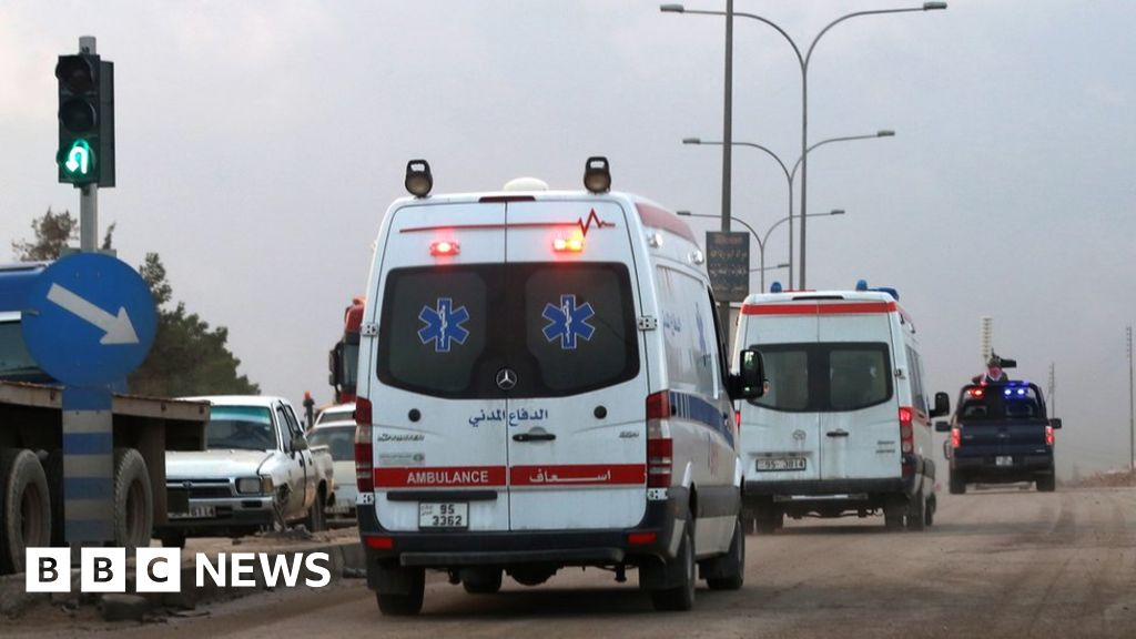 Jordan policeman shoots dead foreign trainers - BBC News