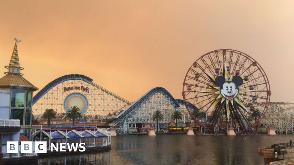 Wildfires cause 'dark' skies at California Disneyland - BBC News