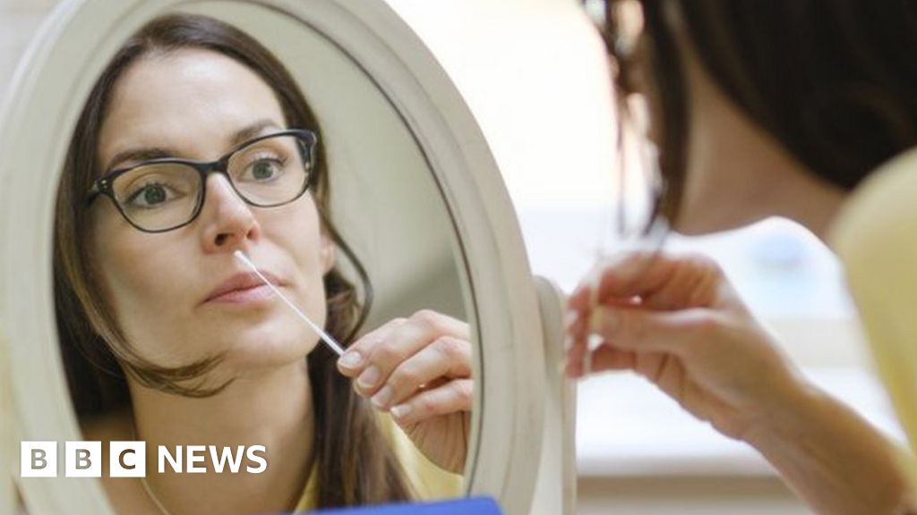 Covid: Call to cut self-isolation to five days in Wales - BBC News