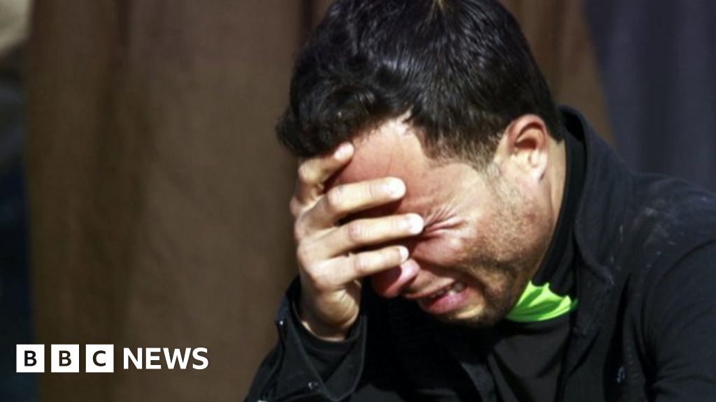 Mourning for Iraq's coalition air strike victims - BBC News