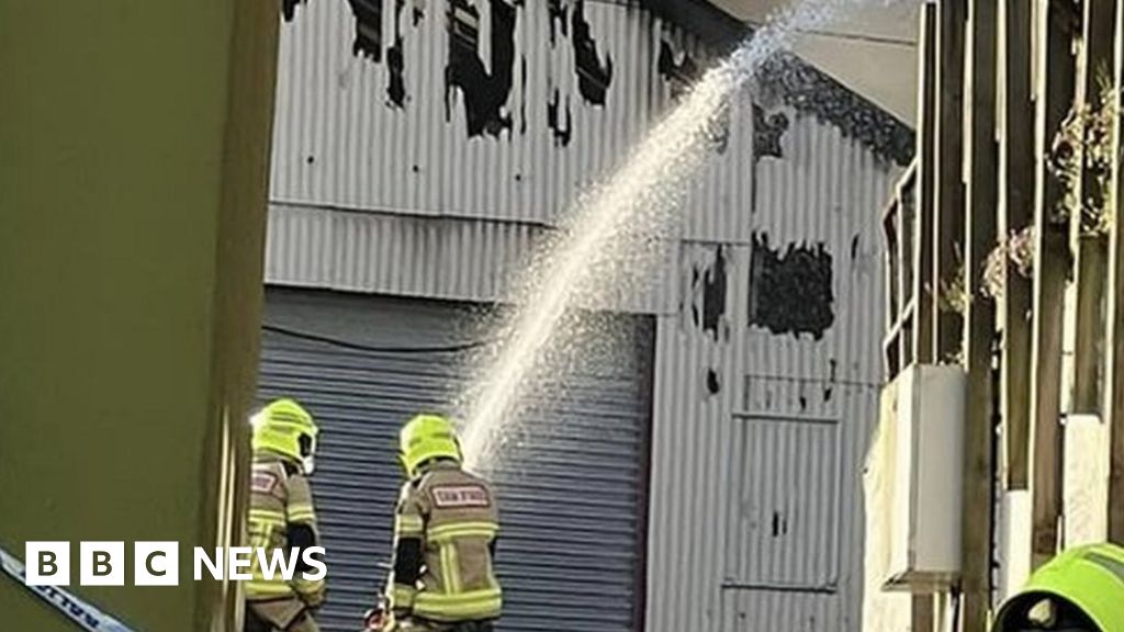 Haverfordwest: Explosions as 30 firefighters fight garage blaze