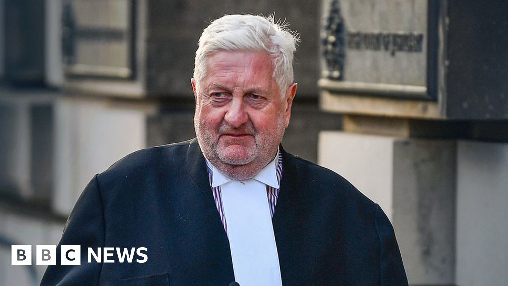 Salmond lawyer suspended over train video comments