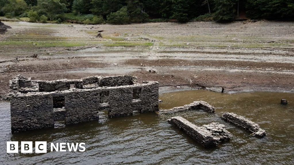 Powys: Flooded reservoir farm appears after another dry spell - BBC News