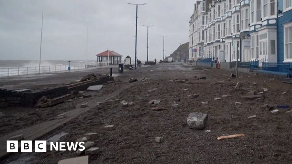 Storm Barra leaves Aberystwyth seafront 'like a war zone' - BBC News