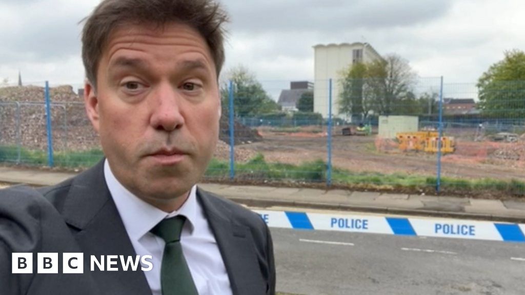 At the scene of police cordon in Northampton after WW2 bomb report ...