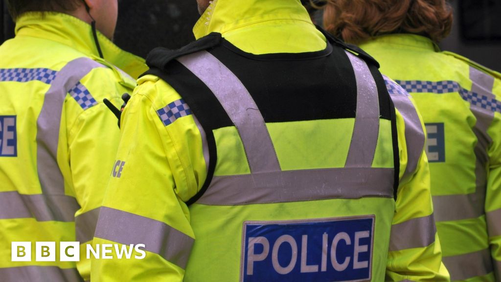 Three charged in UK terror inquiry - BBC News