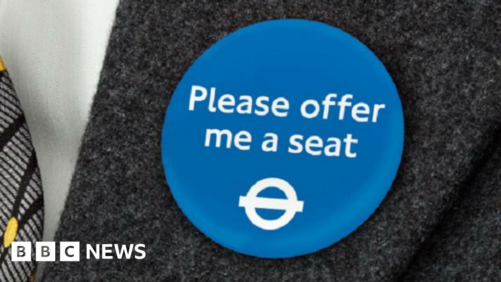 Tube 'please offer me a seat' badges for hidden disabilities - BBC News