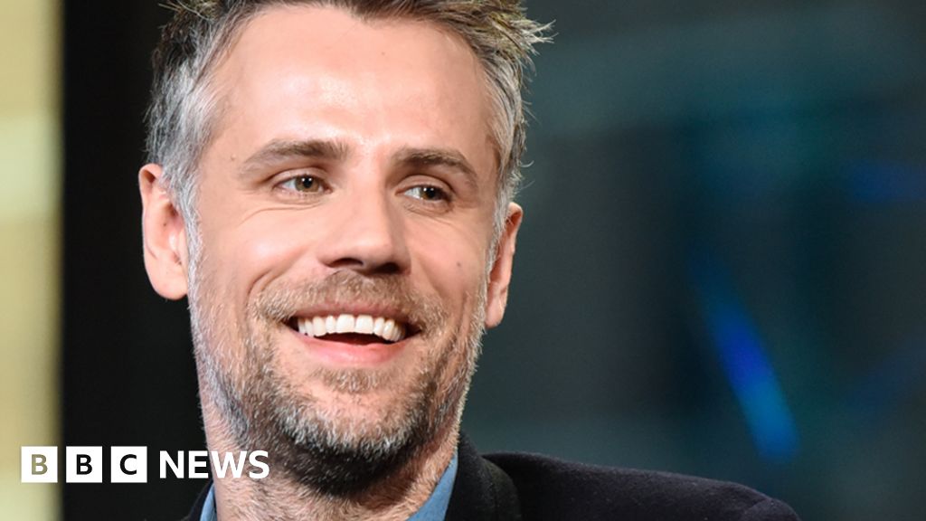Presenter Richard Bacon 'getting better' after days in coma - BBC News